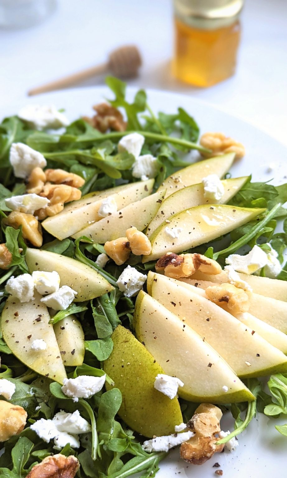 Arugula Pear Salad Recipe with Honey Vinaigrette Dressing - The Herbeevore